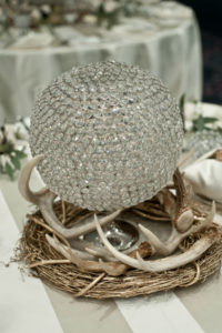 Crystal ball centerpieces with rustic accents - Today's Bride